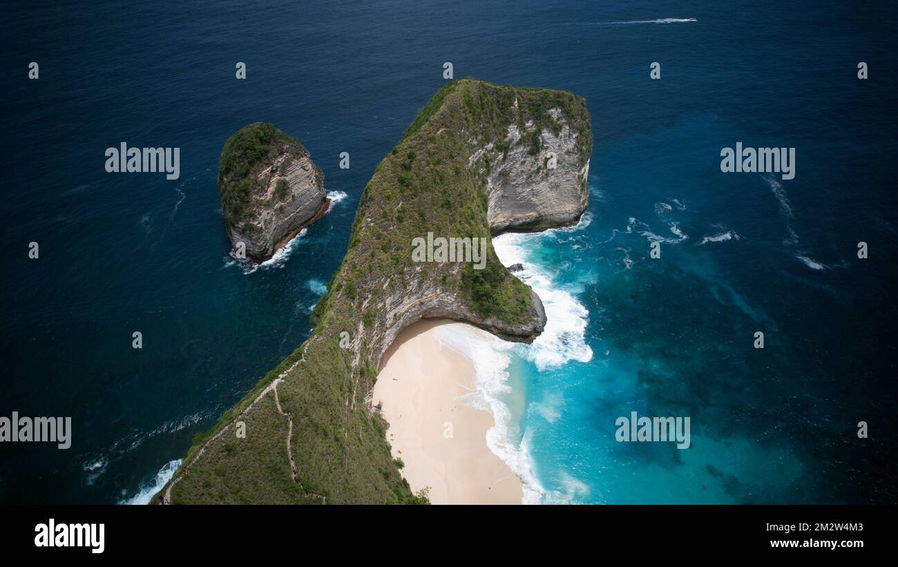 A top view of the Nusa Penida island with high rocky pieces in the ...