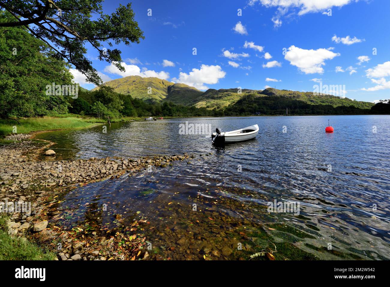 Boats moored at the head of Loch Shiel at Slatach, looking towards the ...