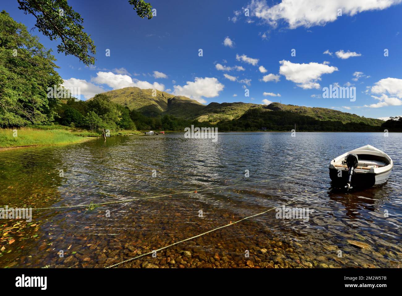 Boats moored at the head of Loch Shiel at Slatach, looking towards the ...
