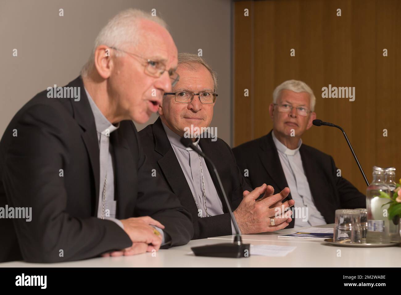 Archbishop Jozef De Kesel, Bishop Pierre Warin of Namur and spokesman ...