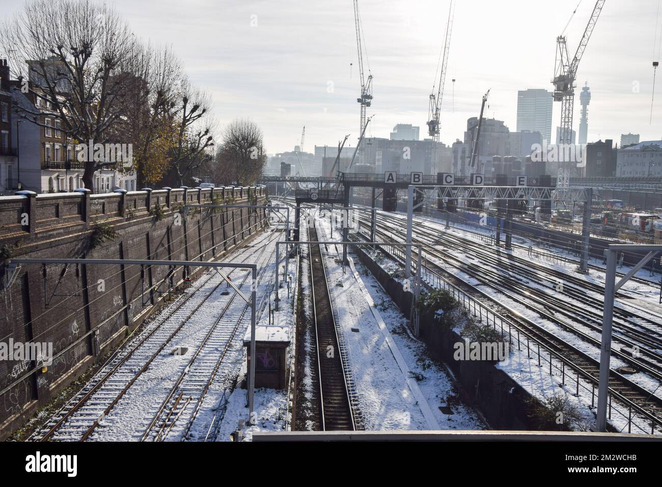 London, England, UK. 14th Dec, 2022. Empty train tracks in Camden are covered in snow and ice as ...