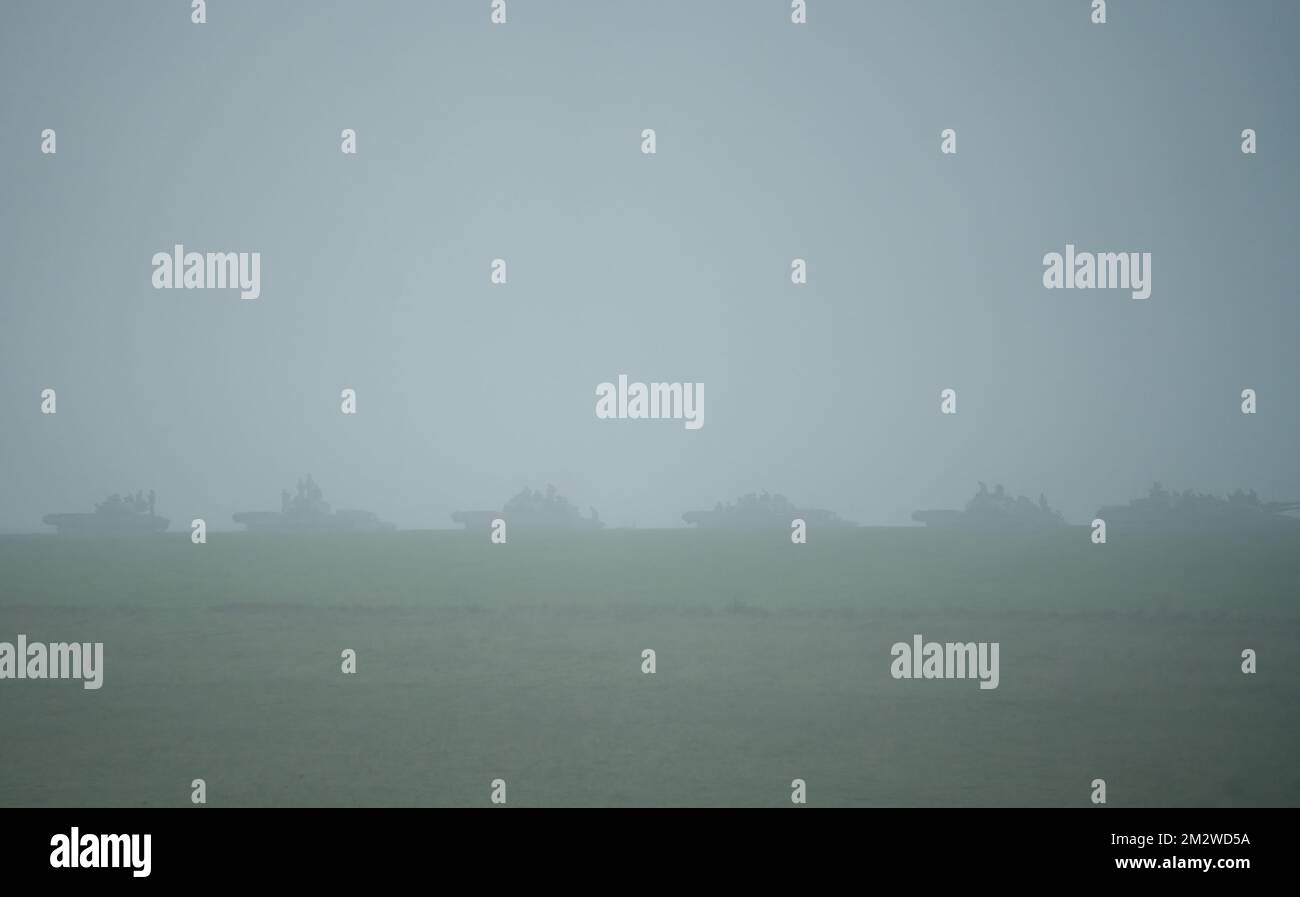 british army Challenger 2 ii FV4034 main battle tanks through fog on a ...