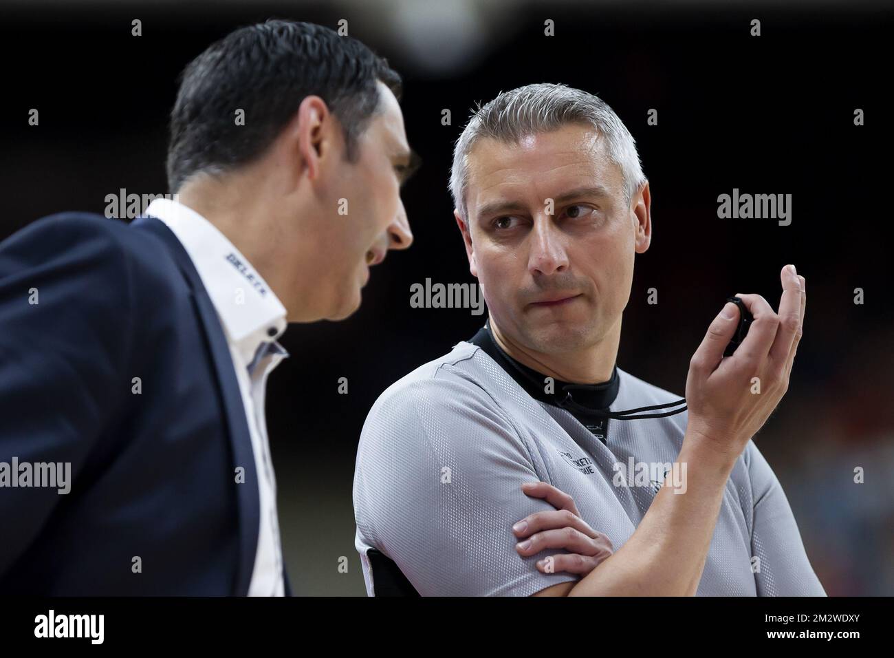 Oostende's head coach Dario Gjergja and referee Renaud Geller pictured ...