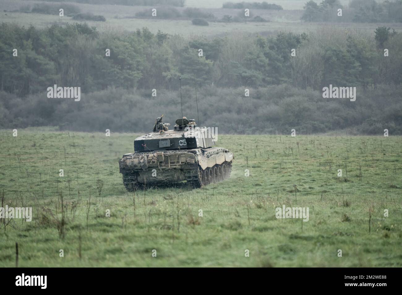 commander and gunner directing action in a British army FV4034 ...