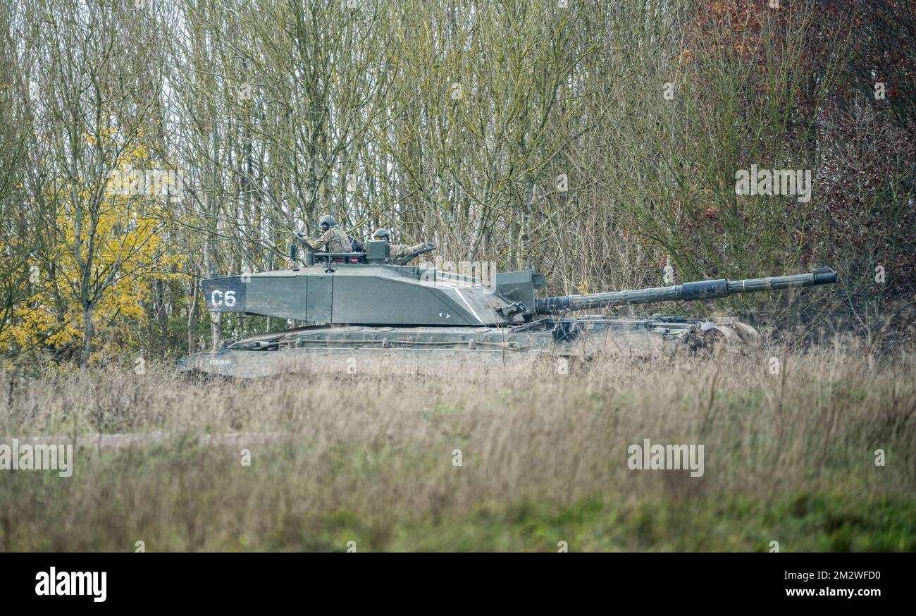 commander and gunner directing action in a British army FV4034 ...
