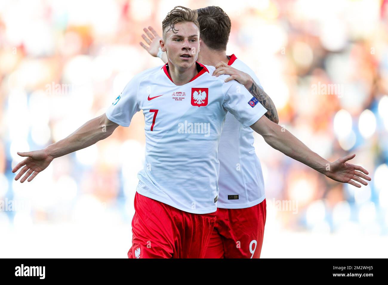Poland's Szymon Zurkowski celebrates after scoring during a game ...