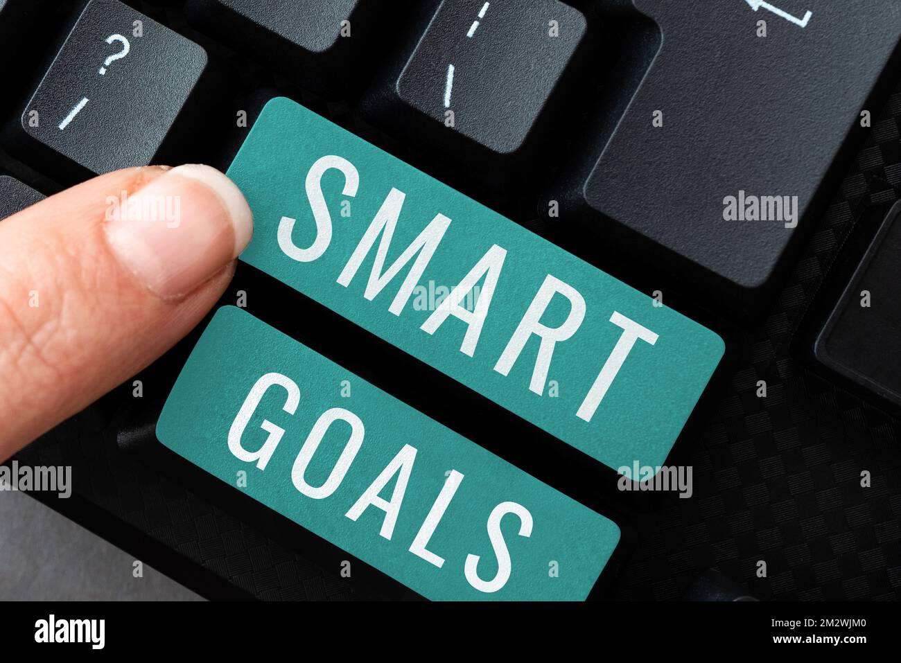 Hand writing sign Smart Goals. Internet Concept mnemonic used as a ...