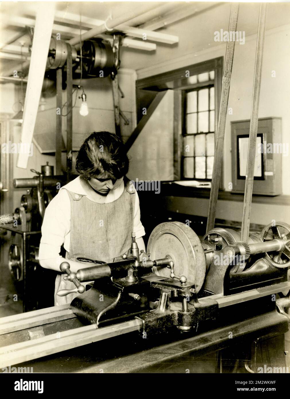 Female student using woodshop tool , Woodworking, Students ...