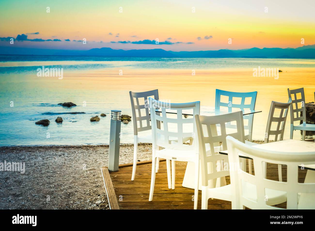 seaside cafe tables Stock Photo - Alamy