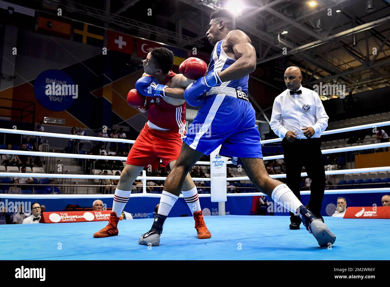 Belgian boxer Victor Schelstraete (blue corner) and Astrian boxer Ahmed ...