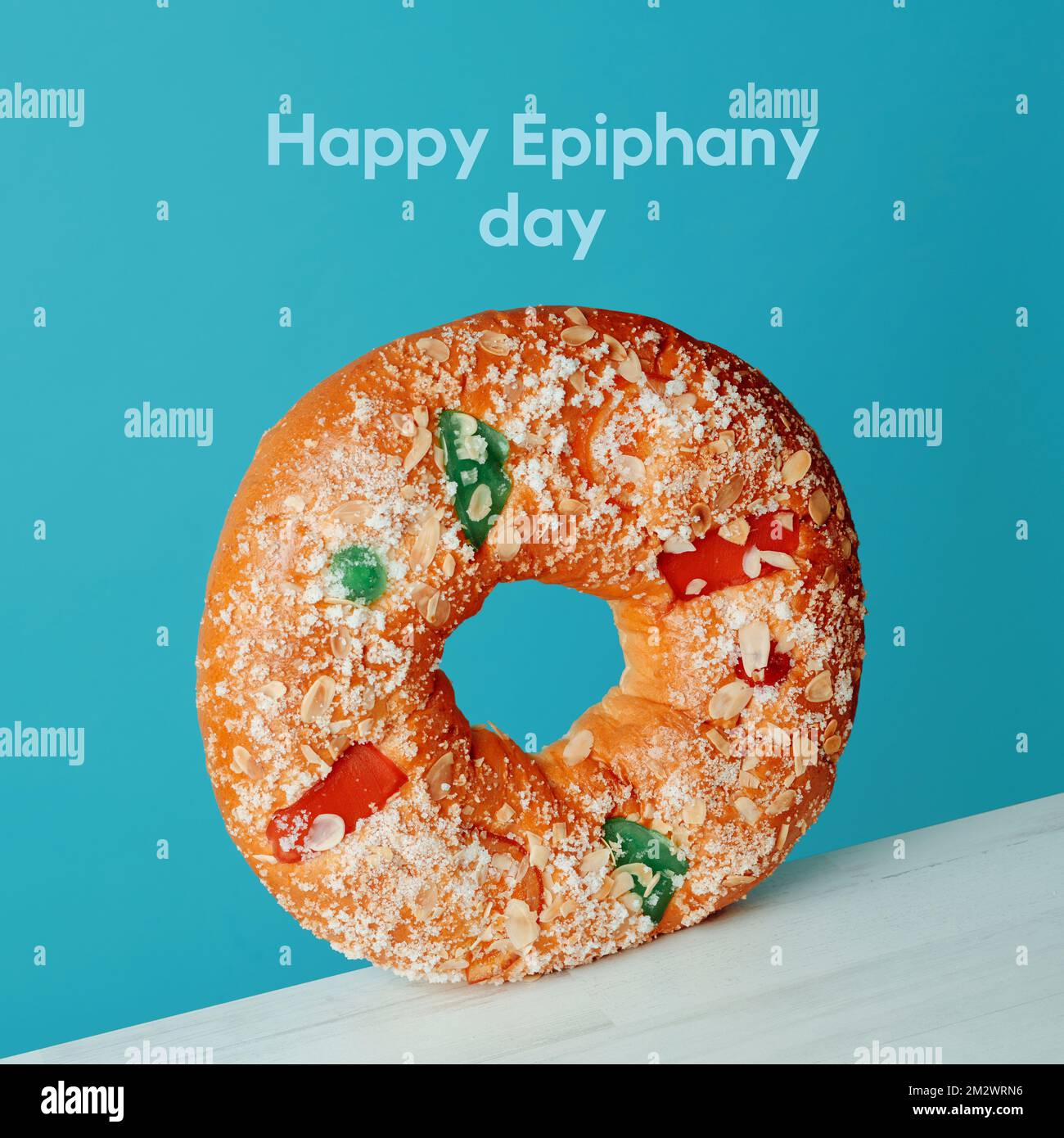 the text happy epiphany day and a roscon de reyes, the spanish king ...
