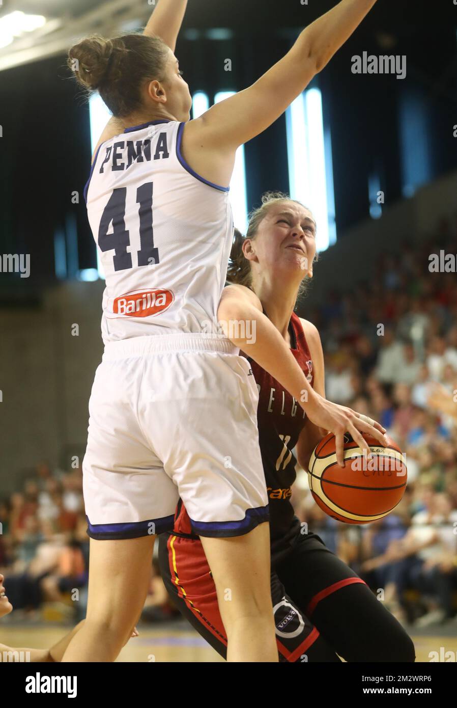 Italian Elisa Penna and Belgian Cats Emma Meesseman fight for the ball ...