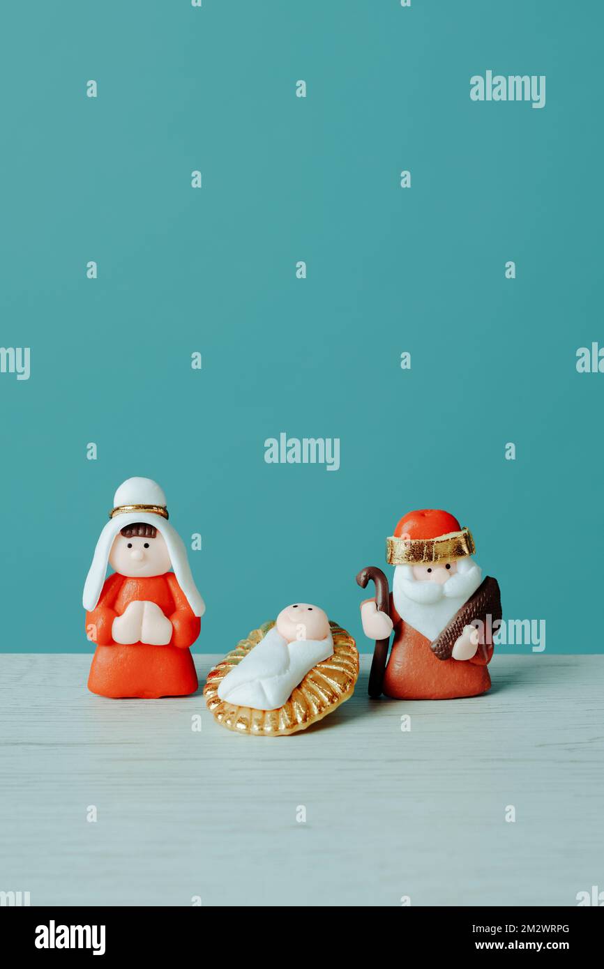 a depiction of the holy family, the virgin mary, the child jesus, and saint joseph, on a white ...