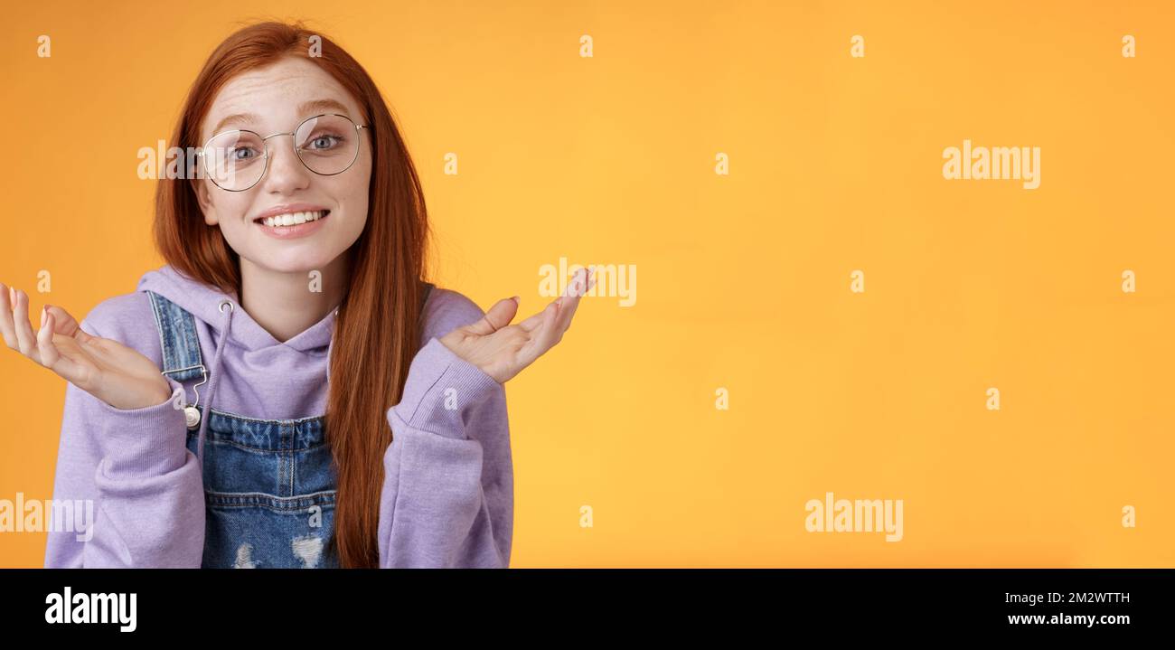 Well no big deal. Attractive silly redhead hipster girl wearing glasses ...