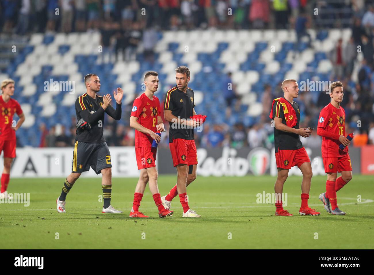 Belgium's players look dejected after a soccer game between Belgium's ...