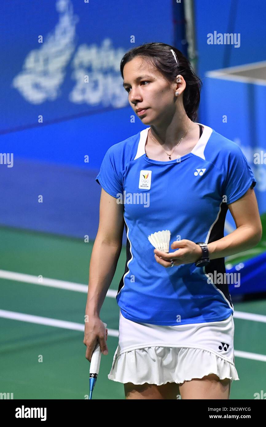 Belgian Lianne Tan looks dejected during the group stage badminton ...