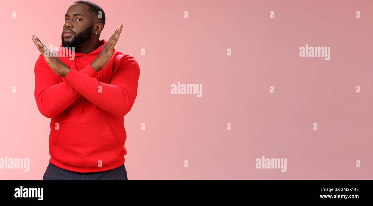 Cut it out. Portrait serious-looking african american male assisant ...