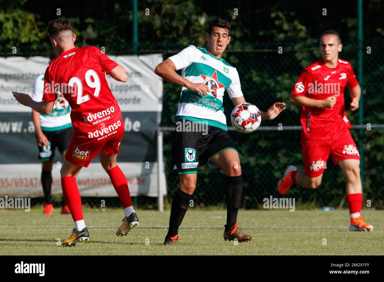Oostende's Robbie D'Haese and Cercle's Kevin Hoggas fight for the ball ...