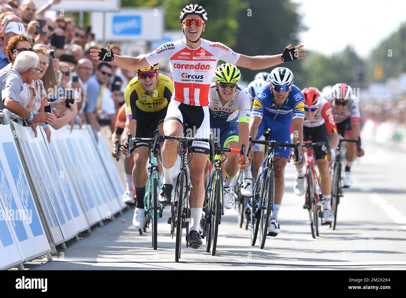 Belgian Tim Merlier of Corendon-Circus celebrates as he crosses the ...