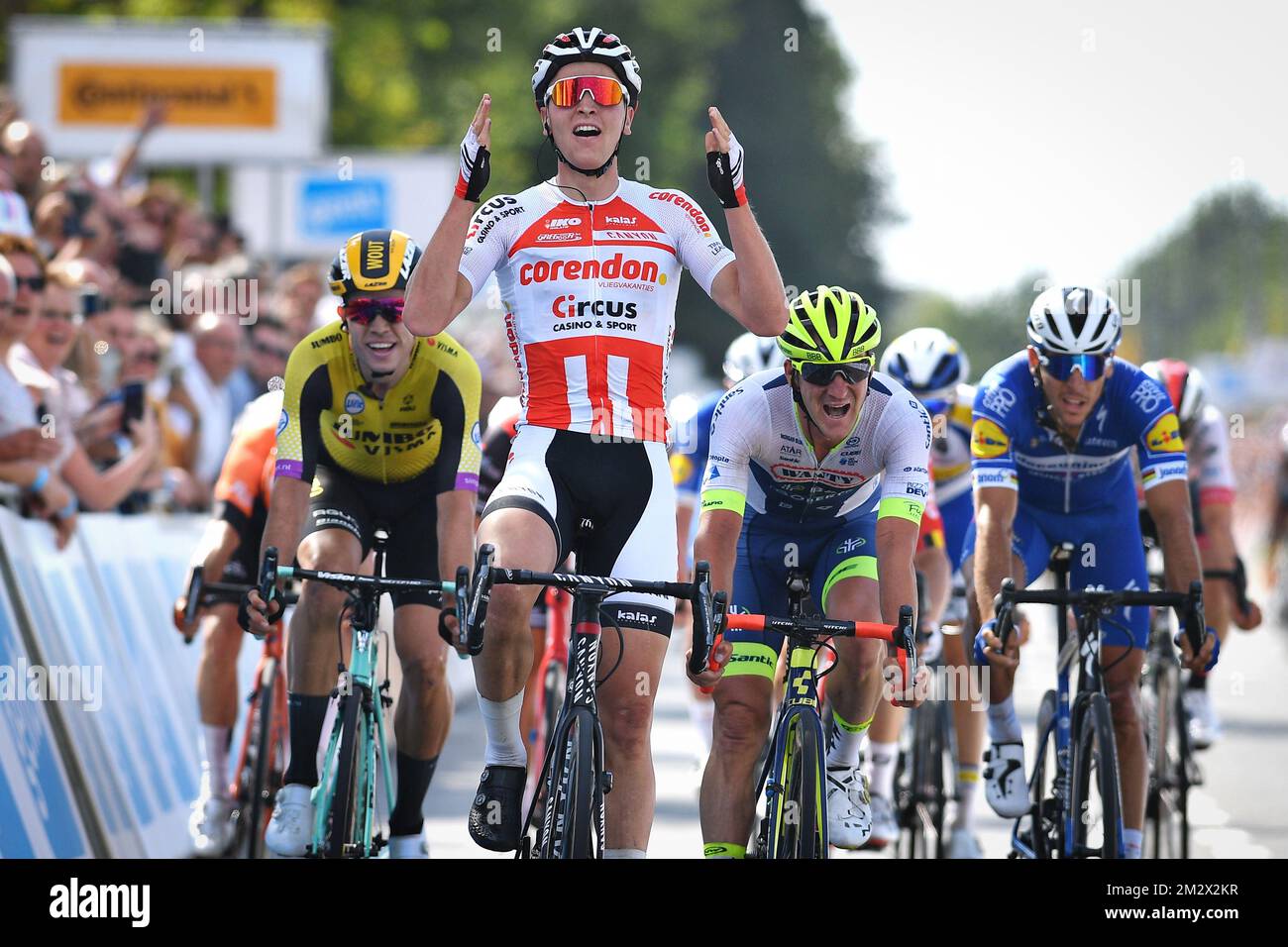 Belgian Tim Merlier of Corendon-Circus celebrates as he crosses the ...