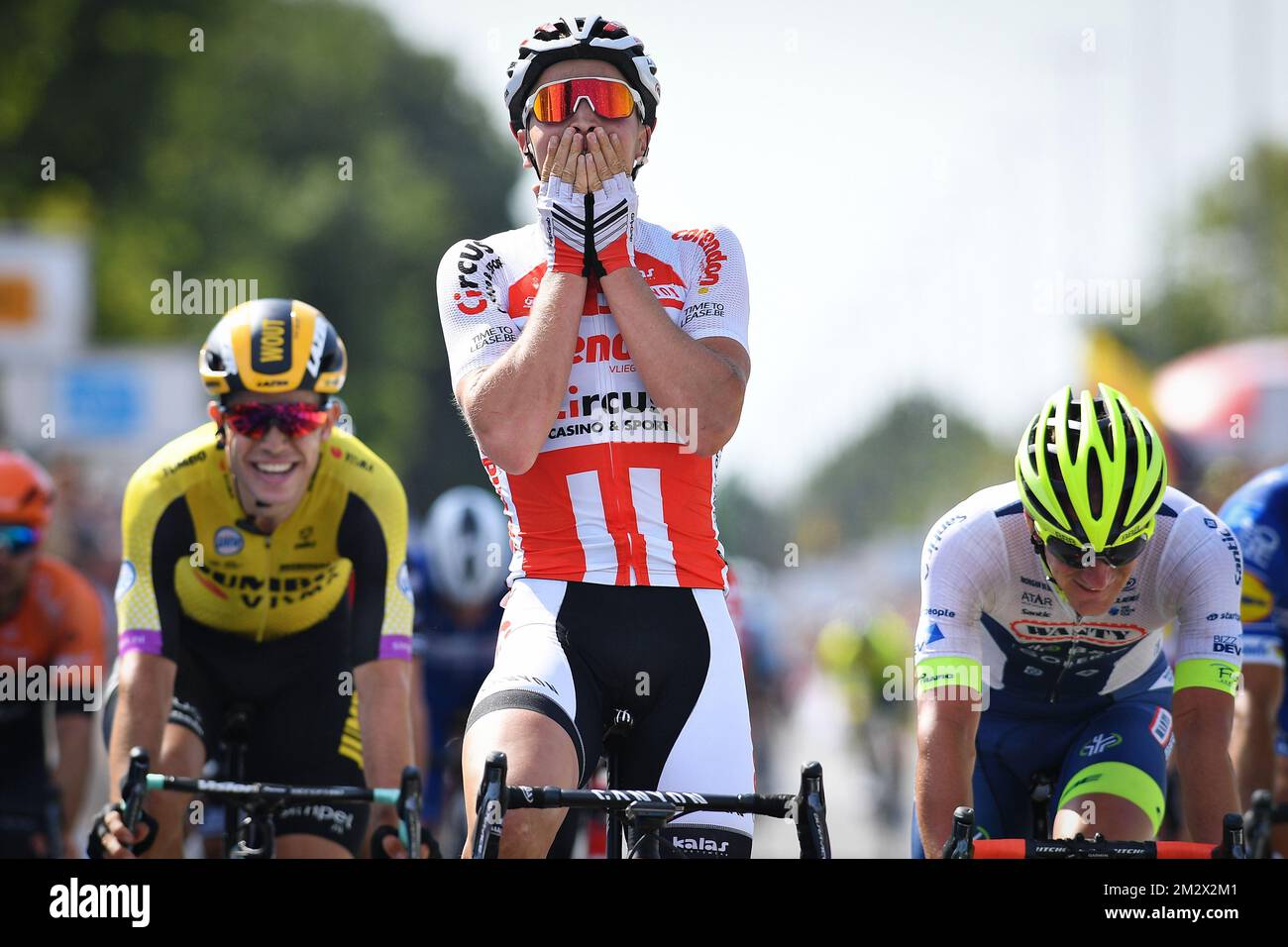 Belgian Tim Merlier of Corendon-Circus celebrates as he crosses the ...