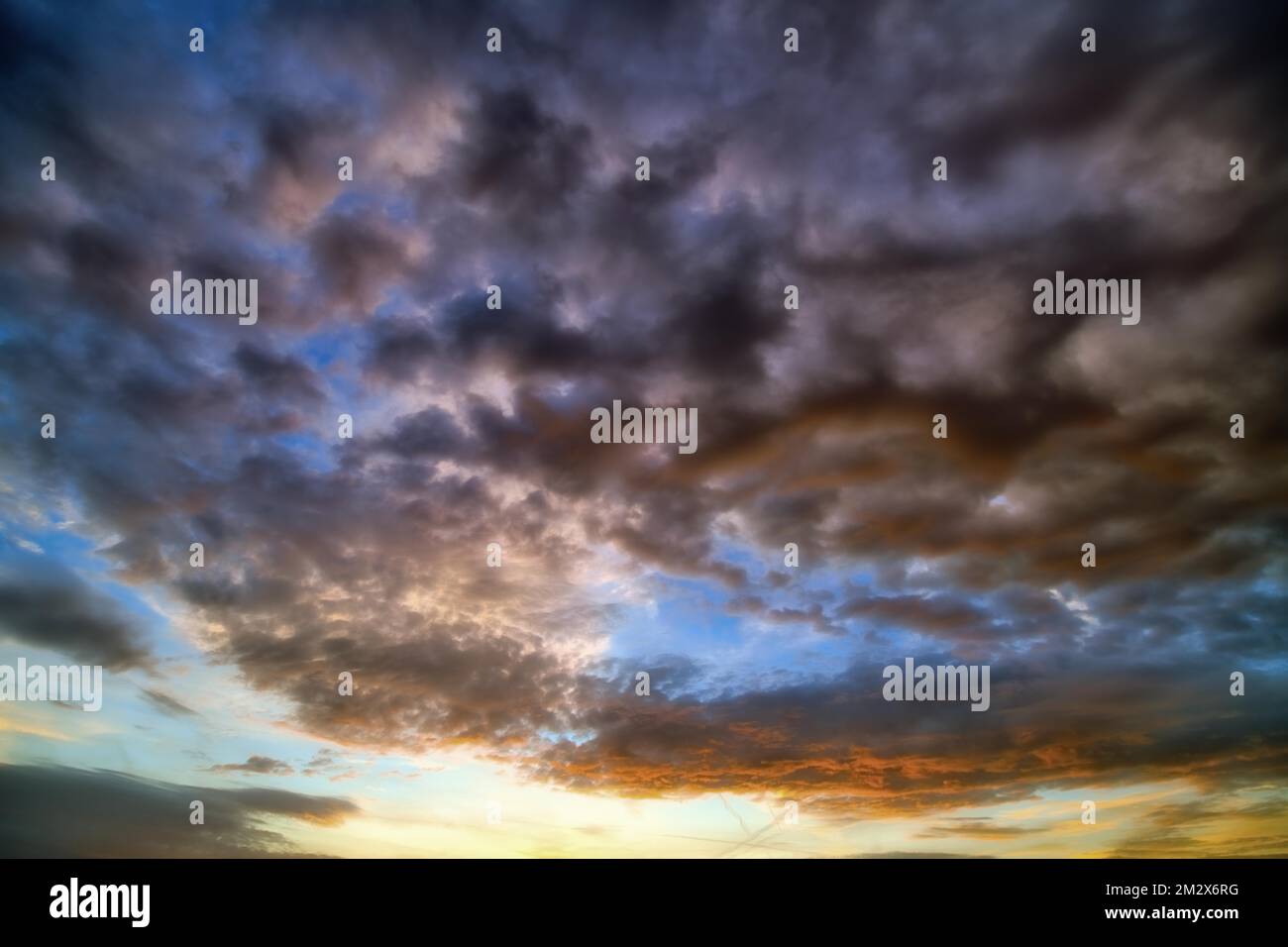 Moody sky with altocumulus cloud (Altocumulus) at dusk after sunset ...