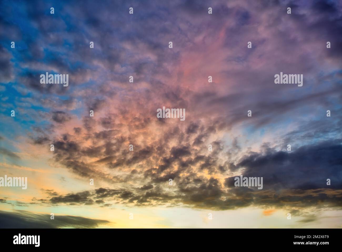 Moody sky with altocumulus cloud (Altocumulus) at dusk after sunset ...
