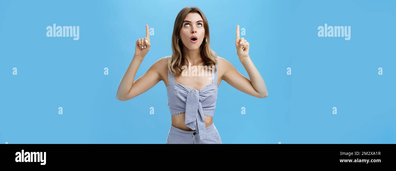 Waist-up shot of curious good-looking stylish modern woman dropping jaw ...