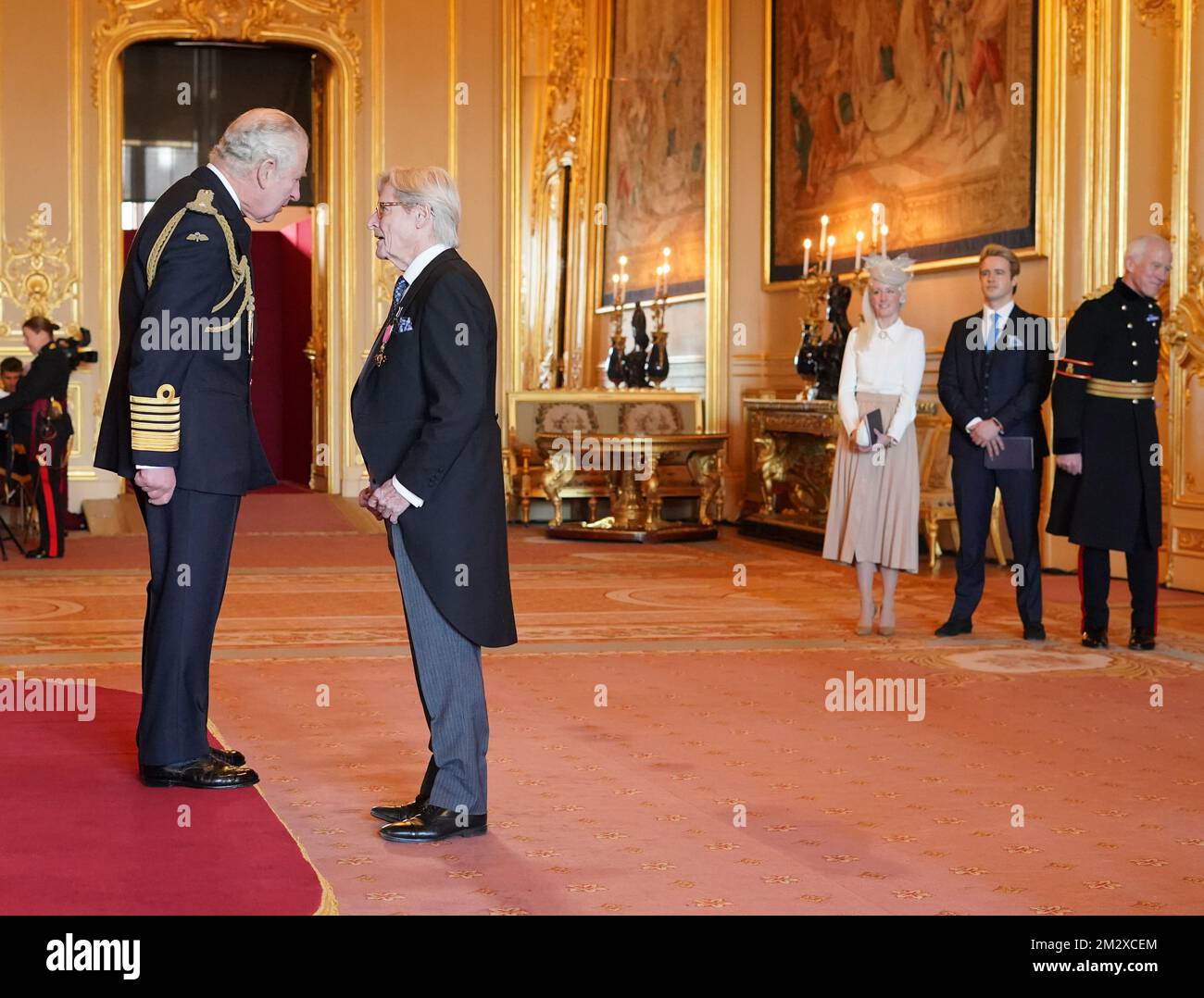 Mr. William Roache, from Wilmslow, is made an Officer of the Order of ...