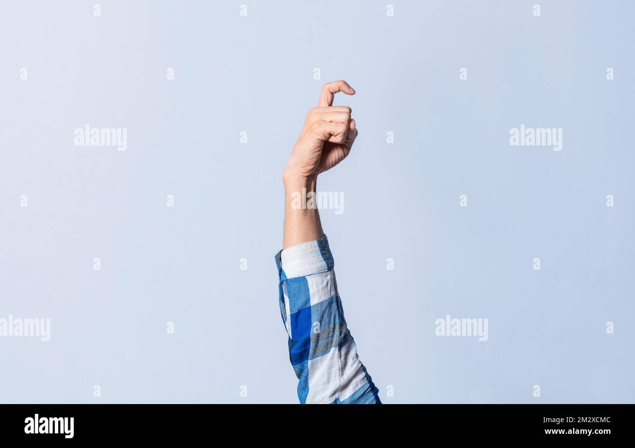 Hand gesturing the letter X in sign language on an isolated background ...