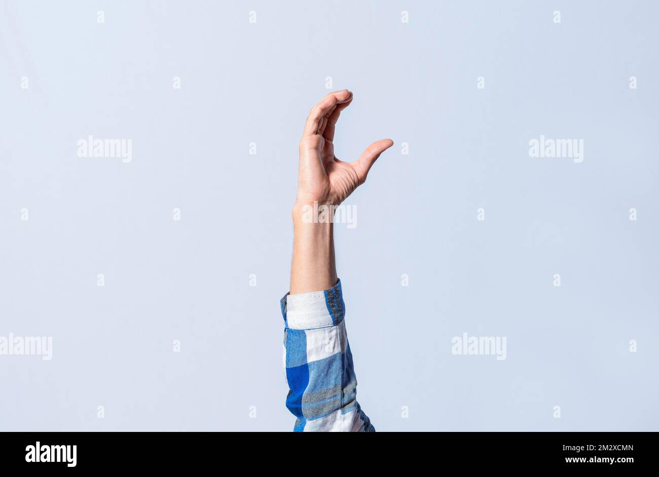 Hand gesturing the letter C in sign language on isolated background ...