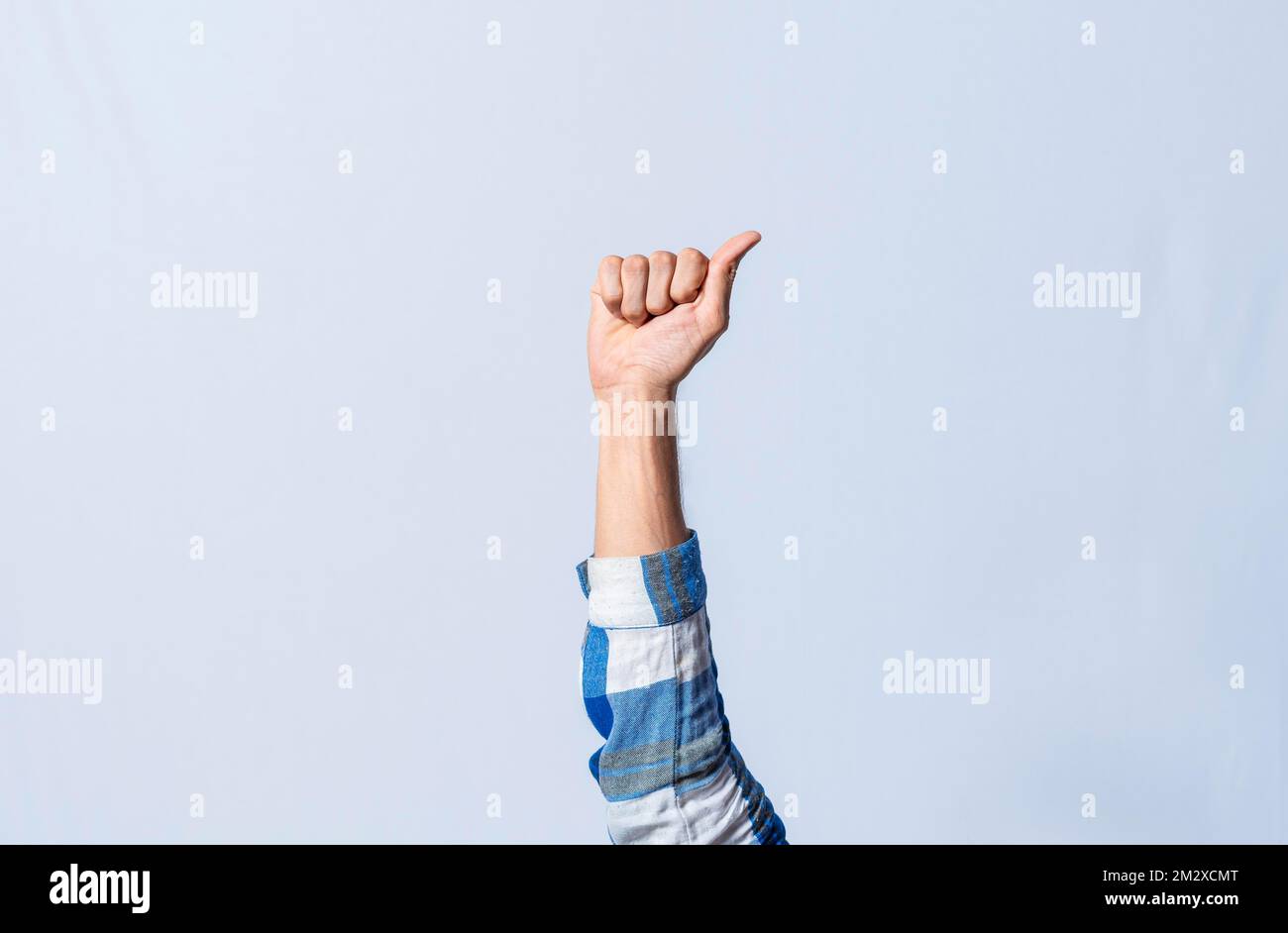 Hand gesturing the letter A in sign language on isolated background ...