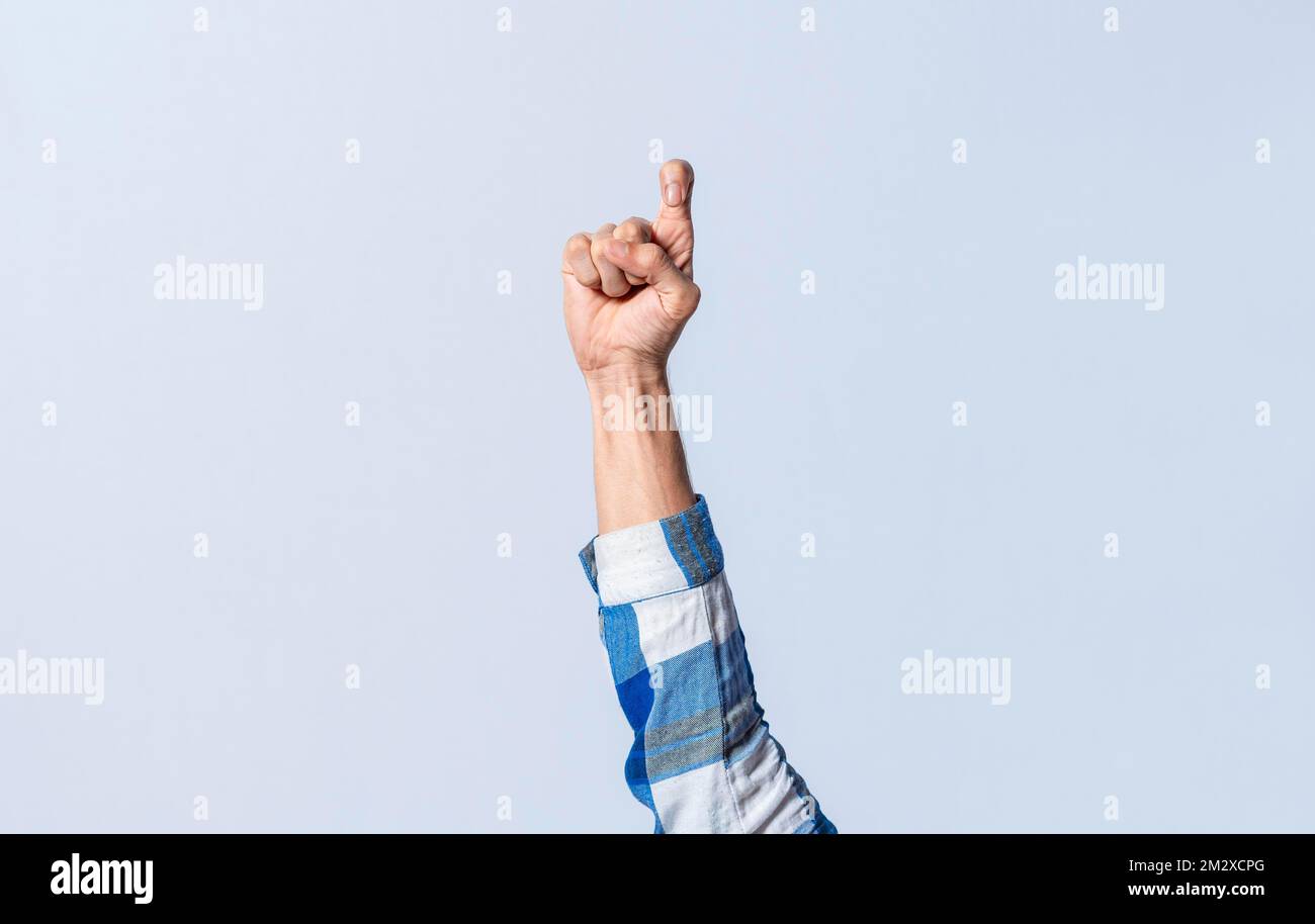 Hand gesturing the letter Z in sign language on an isolated background ...