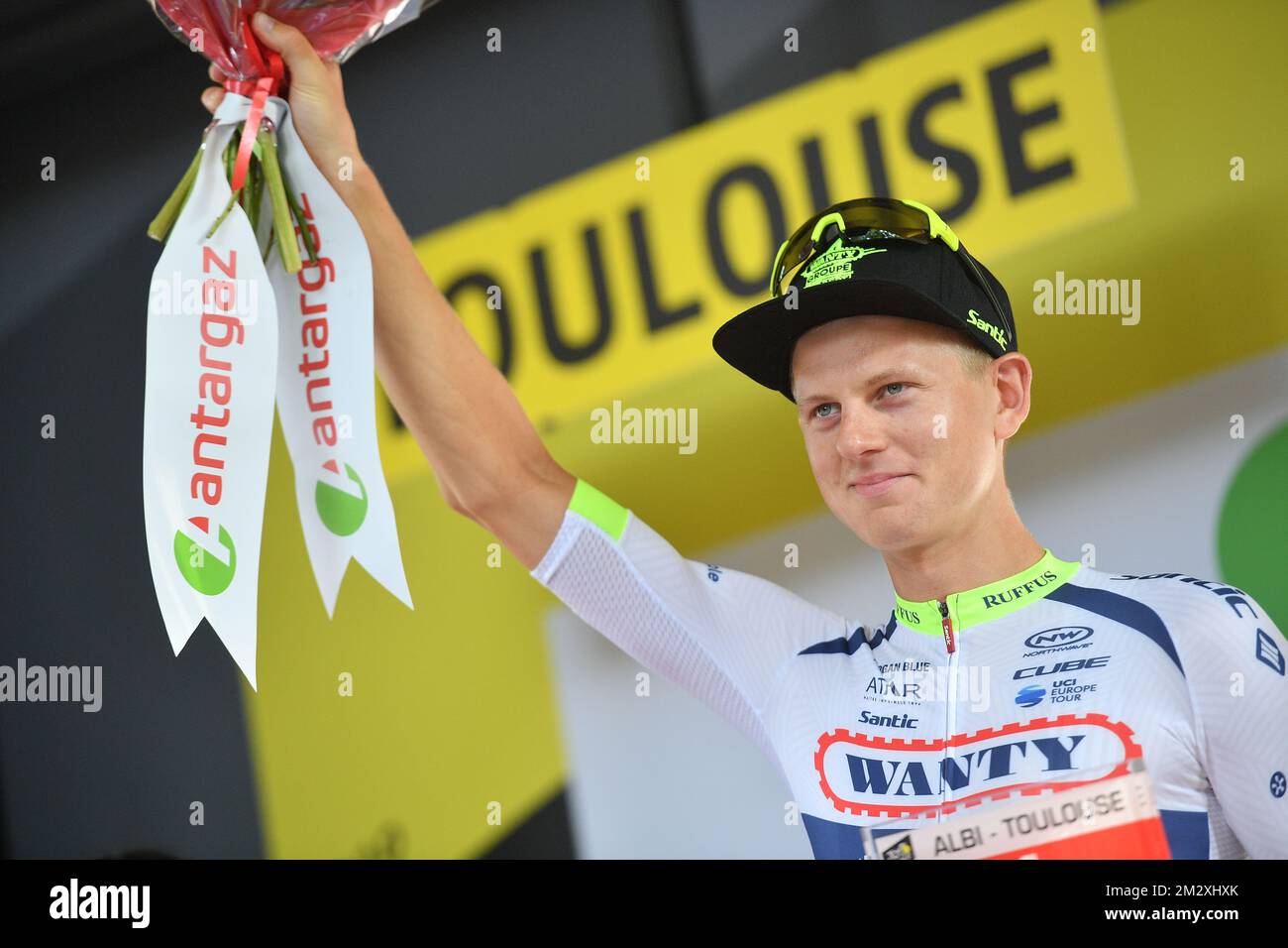 Aime De Gendtt of Wanty-Gobert Cycling Team celebrates on the podium as ...