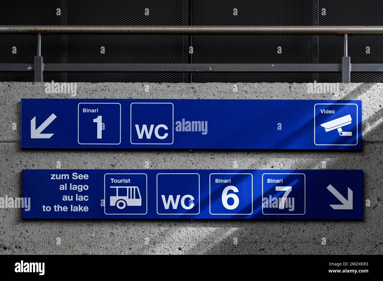 Station signposts and information Stock Photo - Alamy