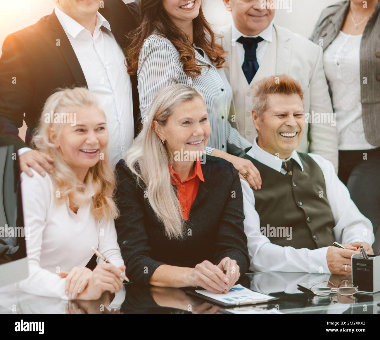portrait of a group of company employees at the workplace in the office ...