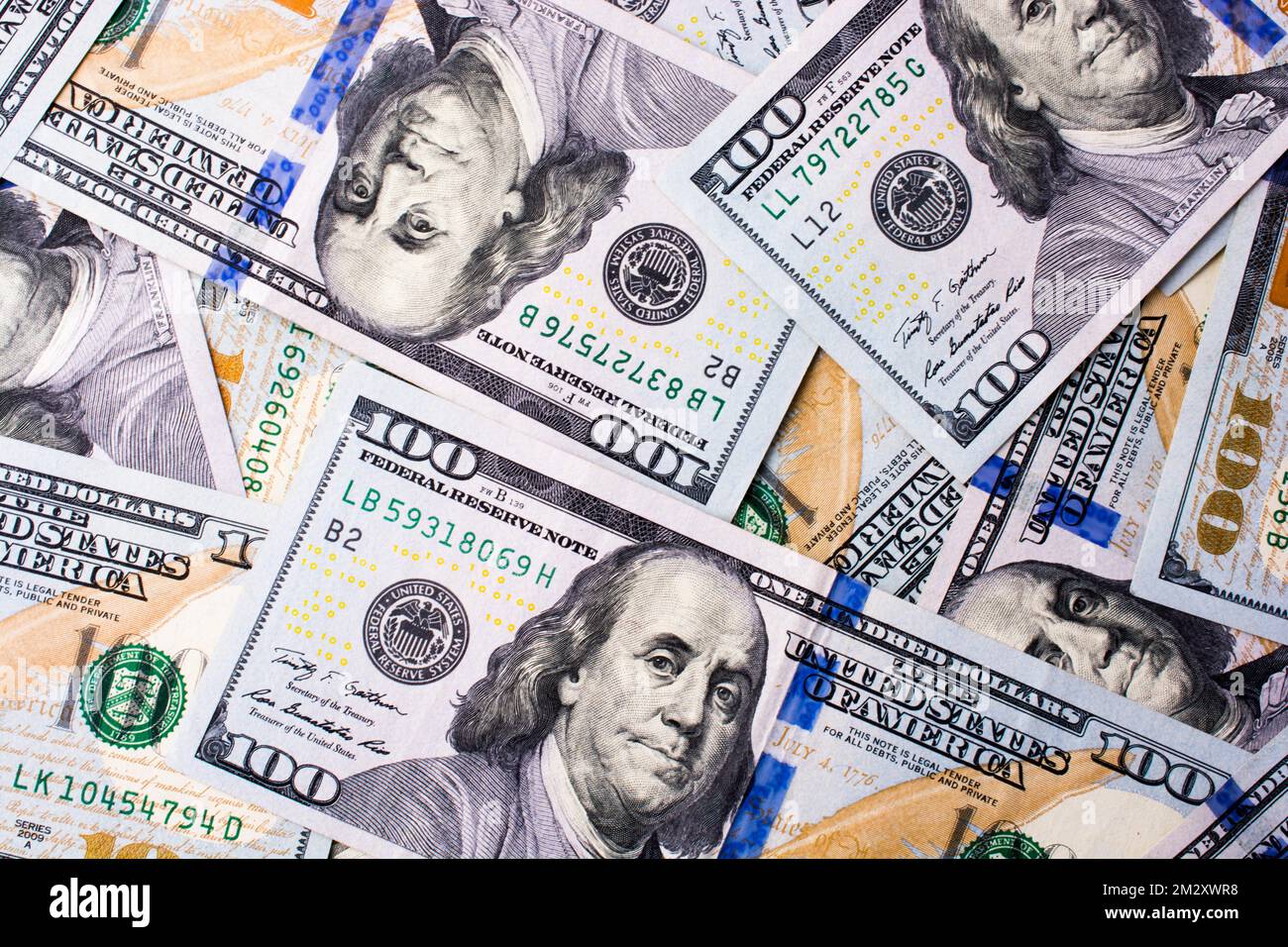 American 100 dollar banknotes made of paper placed on white background ...