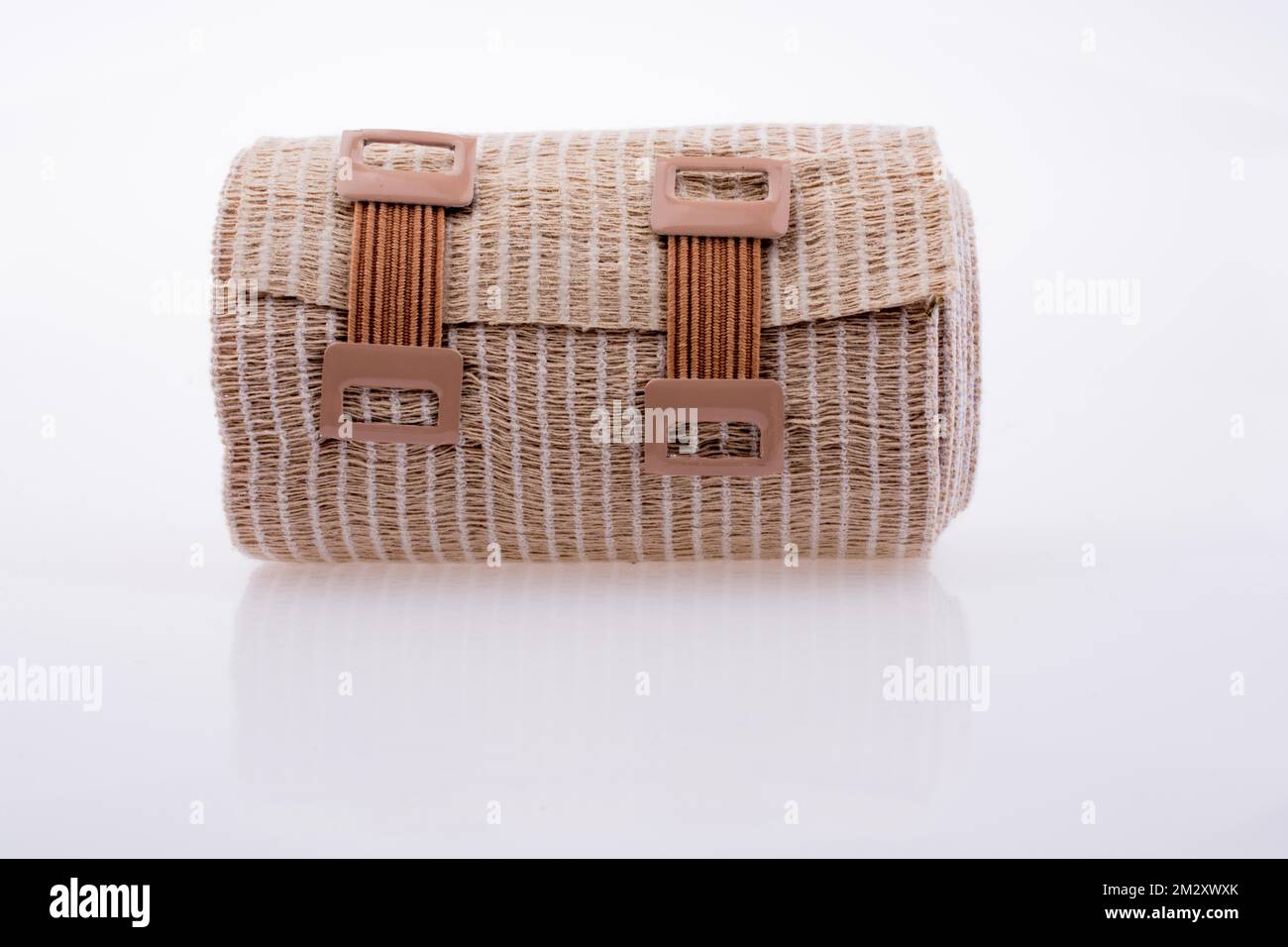 Rolled bandage on a white background Stock Photo - Alamy