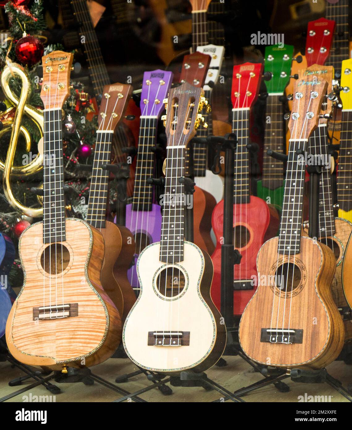 Set of Colorful classical guitar models in view Stock Photo - Alamy