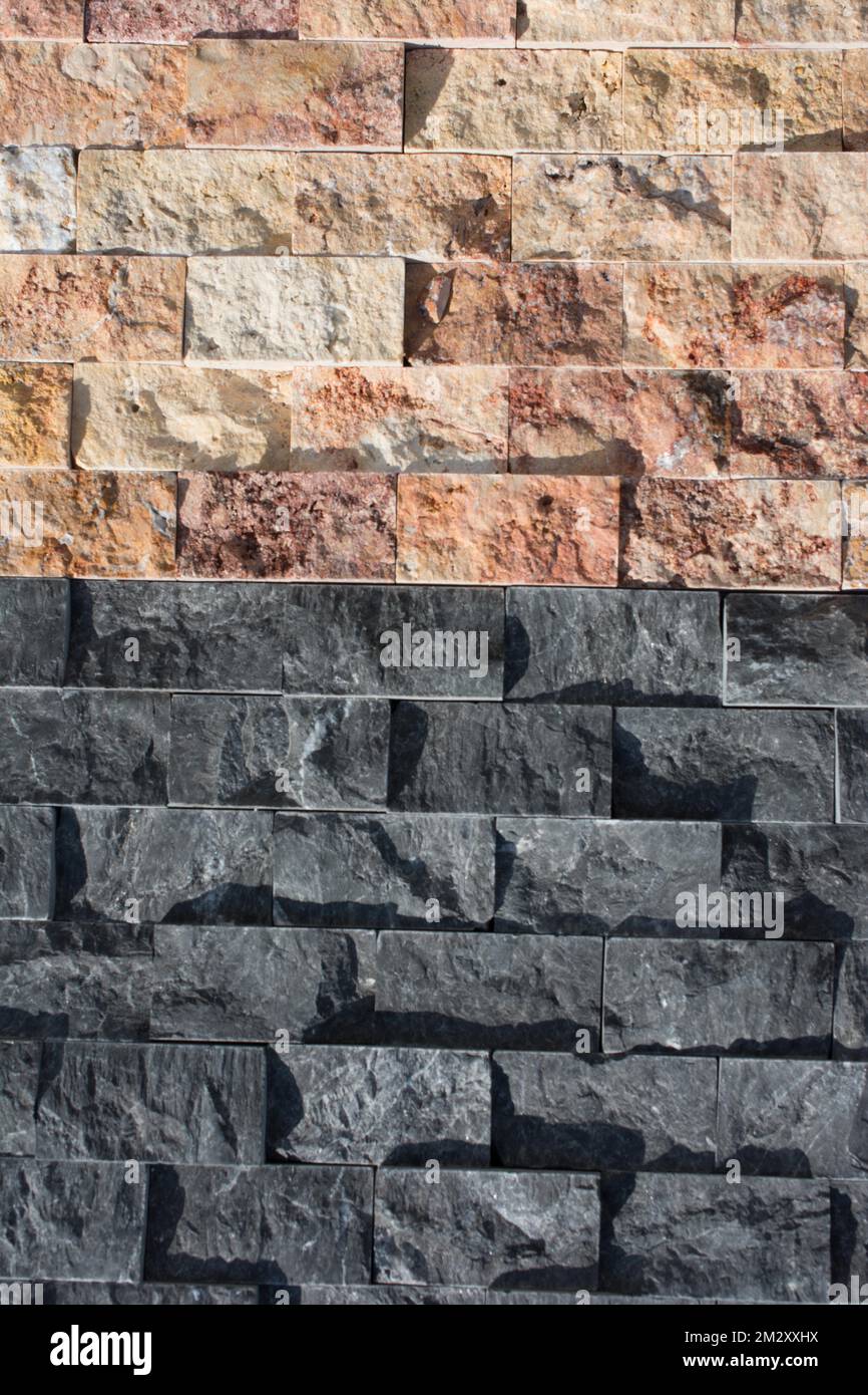 Decorative cubic stone wall as background texture Stock Photo - Alamy