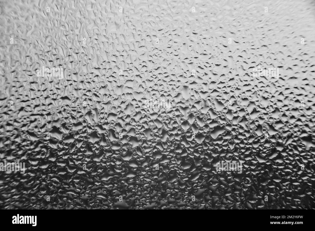The texture on the window made of condensation and water drops, the ...