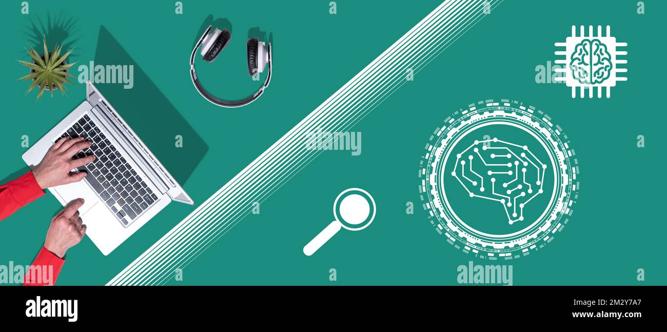 Top view of hands using laptop with symbol of machine learning concept ...