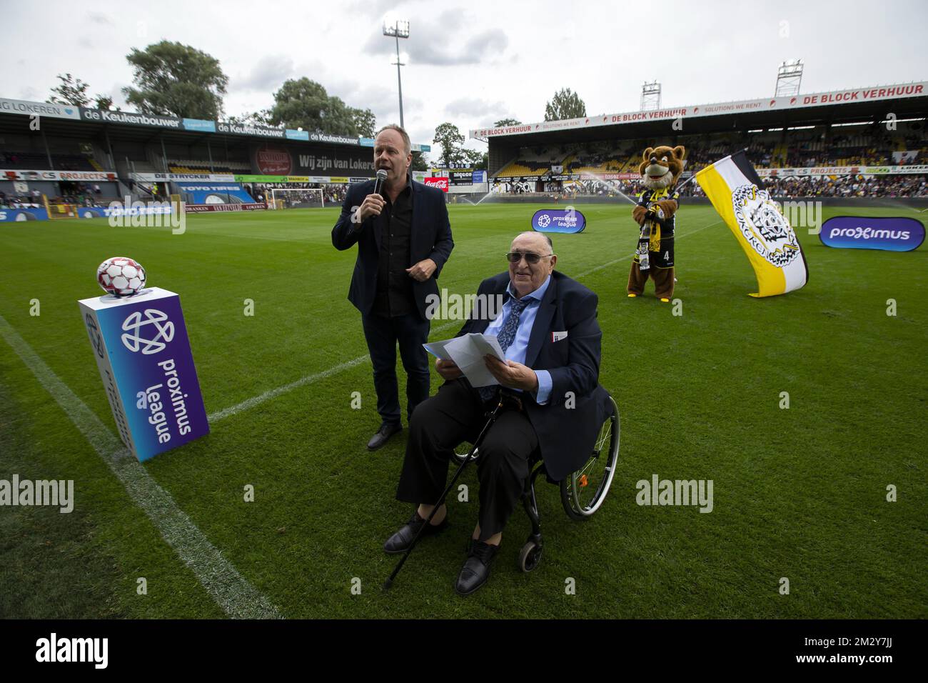Television presenter Ben Crabbe and Lokeren's former chairman Roger ...