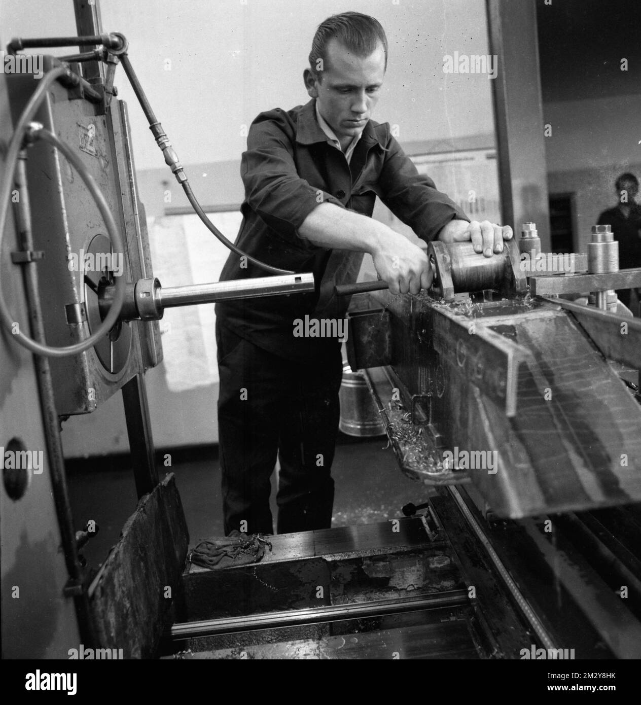 Older workers are retrained in metal trades as locksmiths and lathe ...