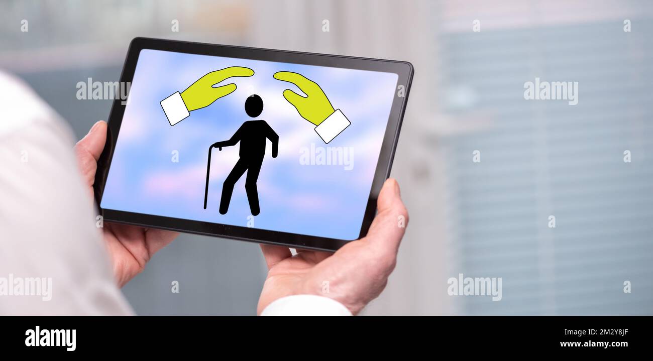 Tablet screen displaying an old age insurance concept Stock Photo - Alamy
