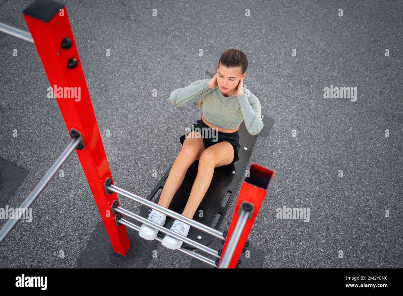 Sit-ups exercises. Active, fit sporty woman doing situps, exercising ...