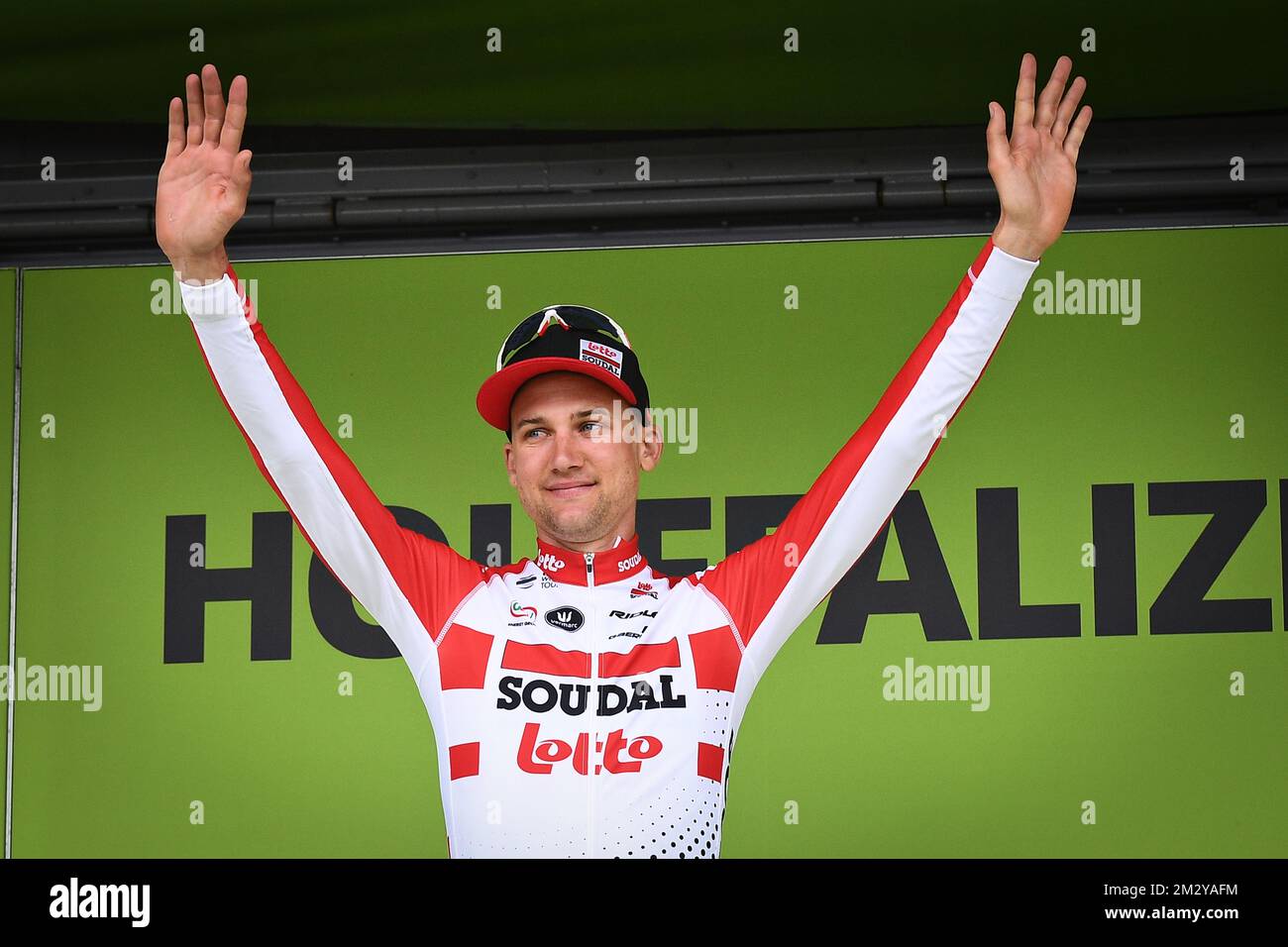 Belgian Tim Wellens of Lotto Soudal celebrates on the podium after ...