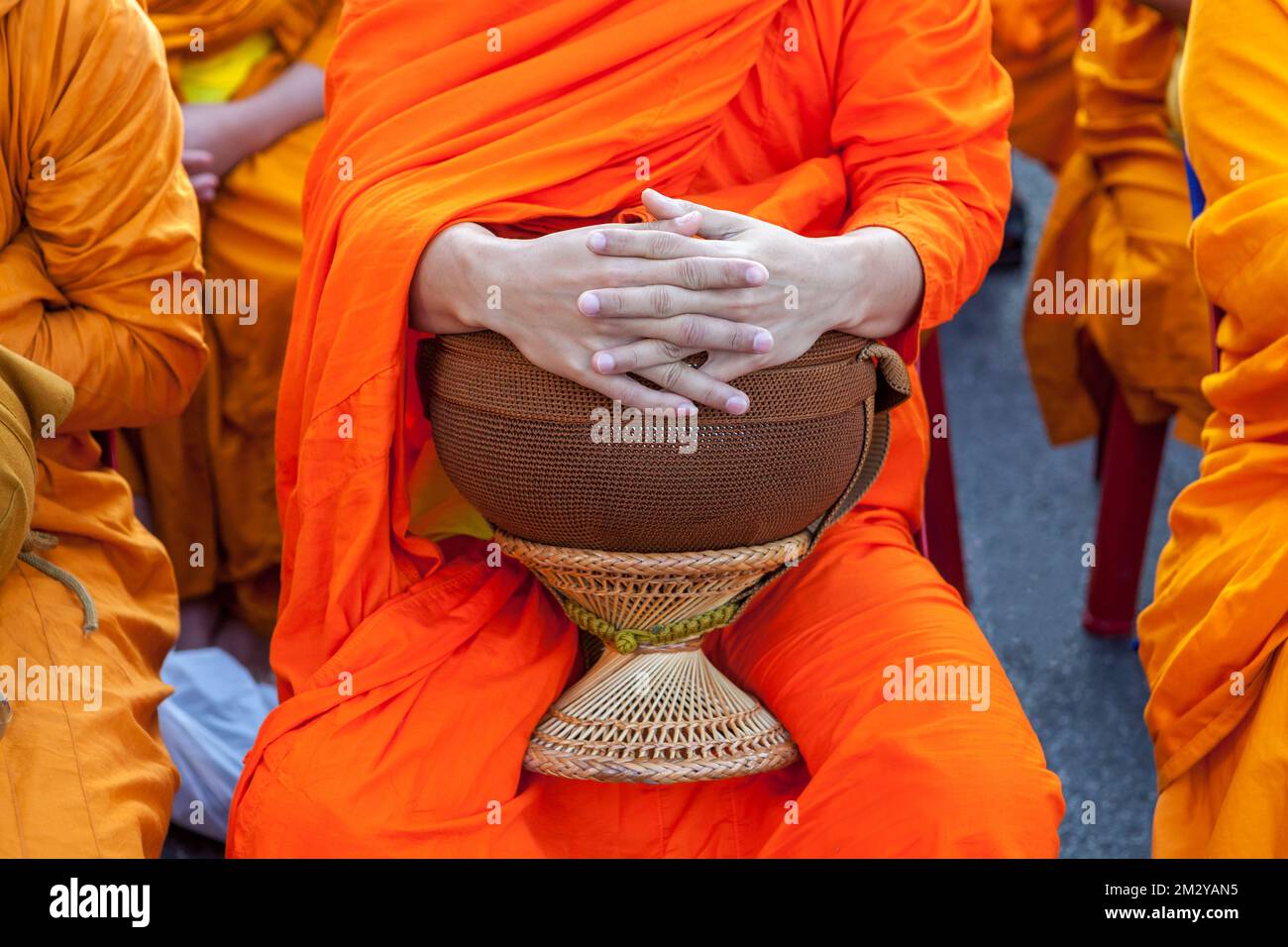 Buddhist monk's bowl in hands. Thai monk bowl for alms collection Stock ...