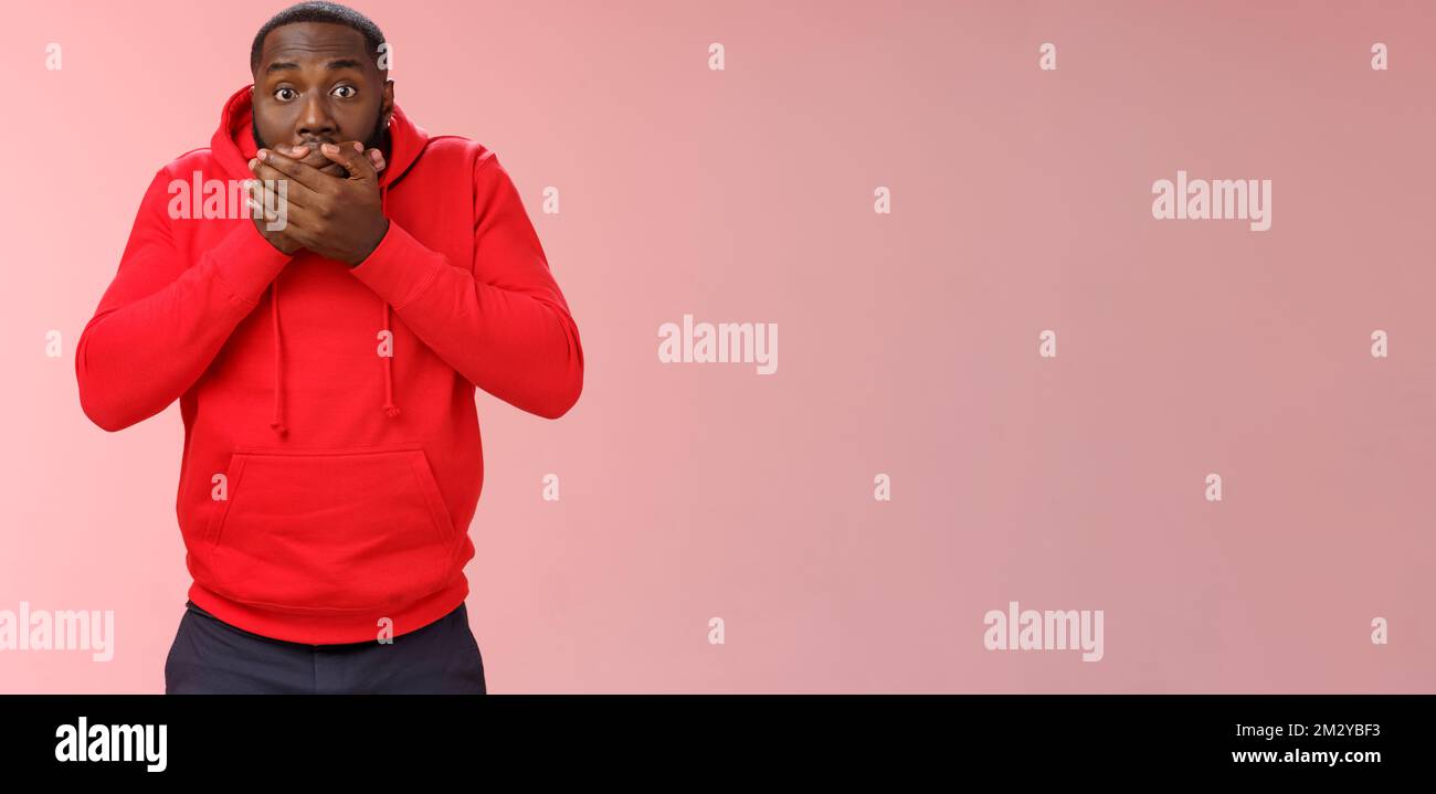 Shocked gasping surprised african-american guy overhear stunning rumour ...