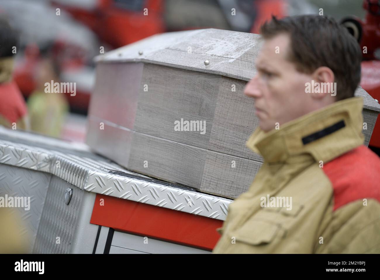 Illustration picture shows a firefighter truck carrying the coffin of a ...